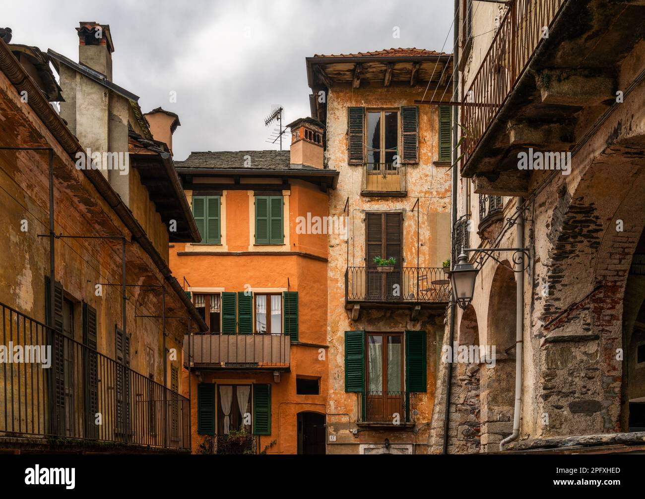 Orta San Giulio, Italy - 13 March, 2023: colorful shabby buildings in ...