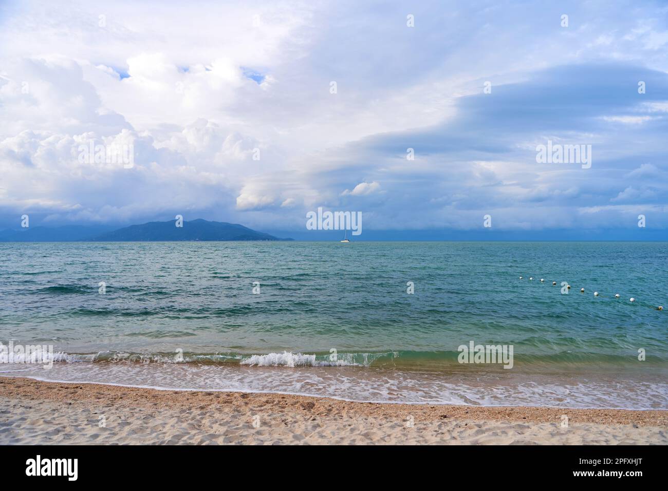 Rain clouds over an island in the sea. The rain is coming Stock Photo ...