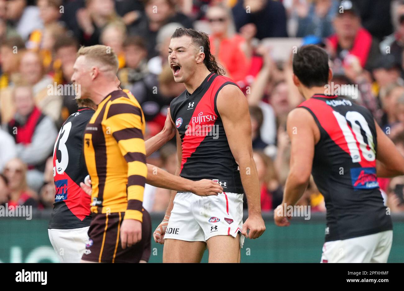 Sam Draper of the Bombers celebrates after kicking a goal during the ...