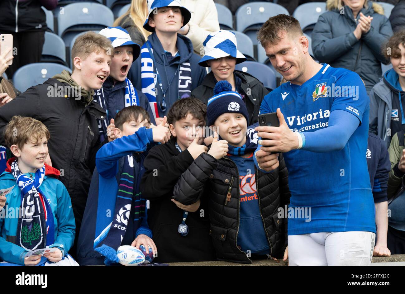 Edinburgh, UK. 18th Mar, 2023. Federico Ruzza of Italy meets some young ...