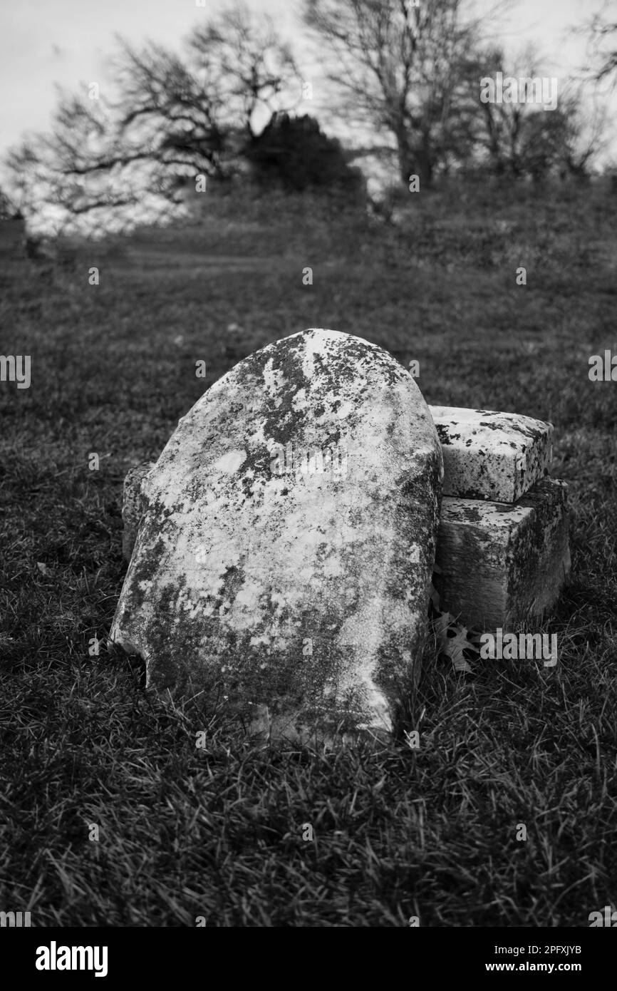 Vintage traditional stone gravestone with a blank epitaph and room for ...