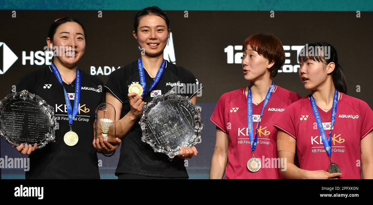 Korea's Kim So Yeong and Kong Hee Yong, left, pose with trophy after ...