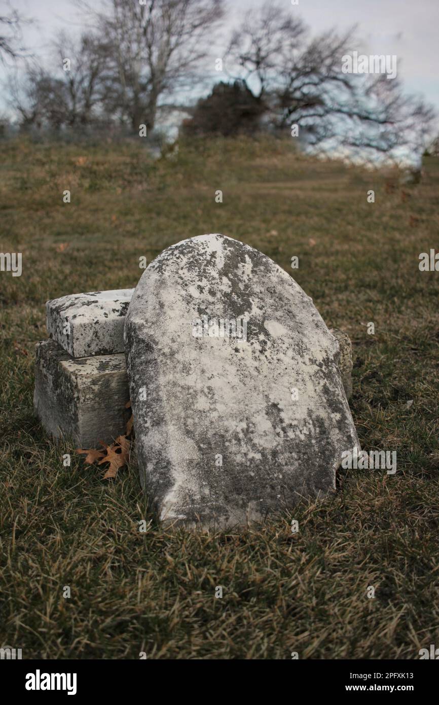 Vintage traditional stone gravestone with a blank epitaph and room for ...