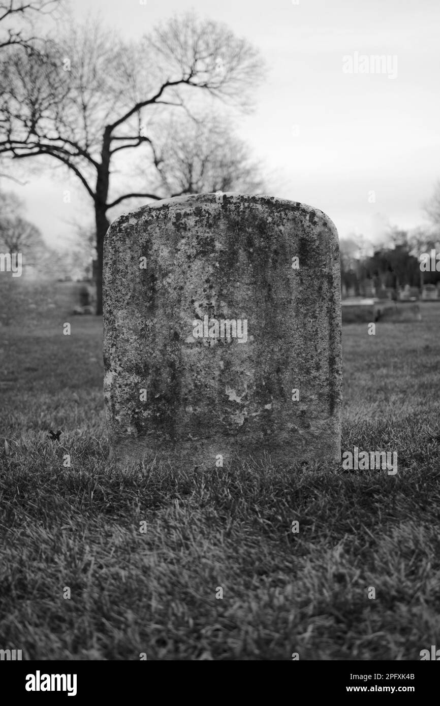 Vintage traditional stone gravestone with a blank epitaph and room for ...