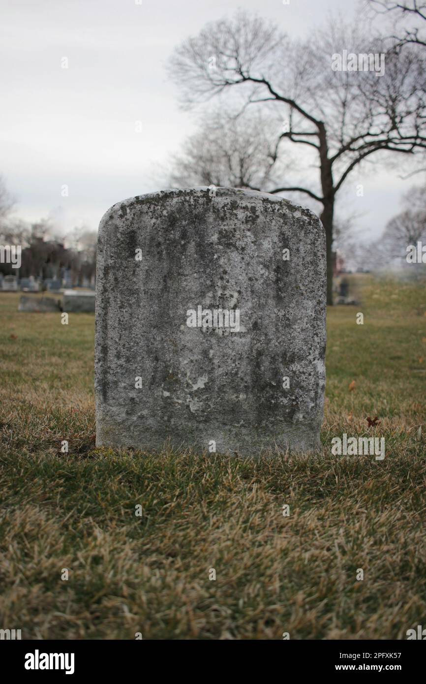 Vintage traditional stone gravestone with a blank epitaph and room for ...