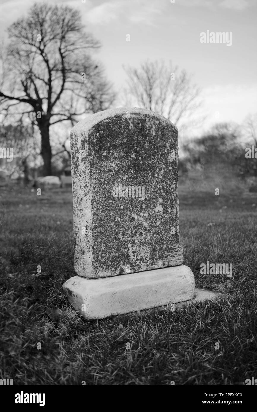 Vintage traditional stone gravestone with a blank epitaph and room for ...