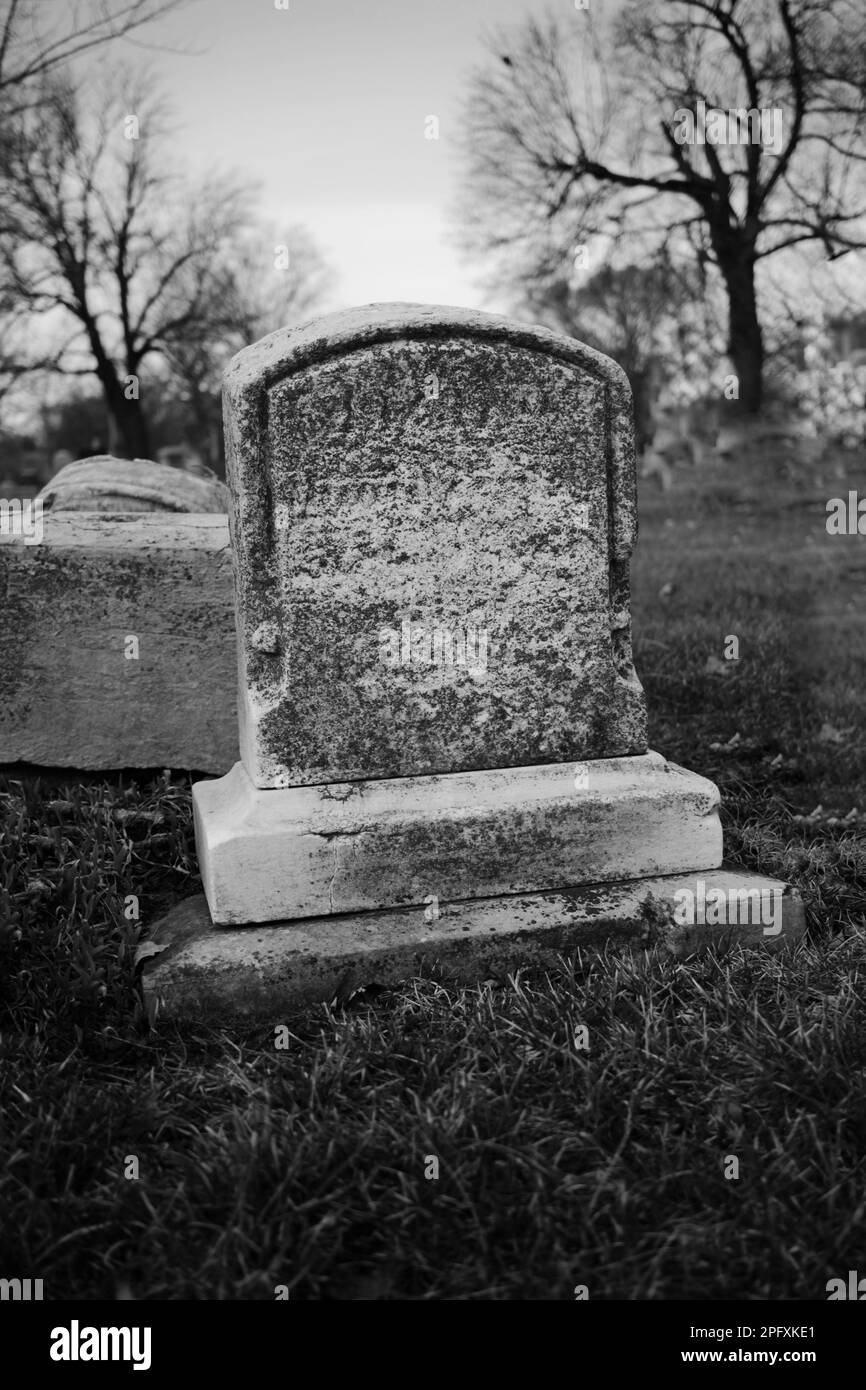 Vintage traditional stone gravestone with a blank epitaph and room for ...