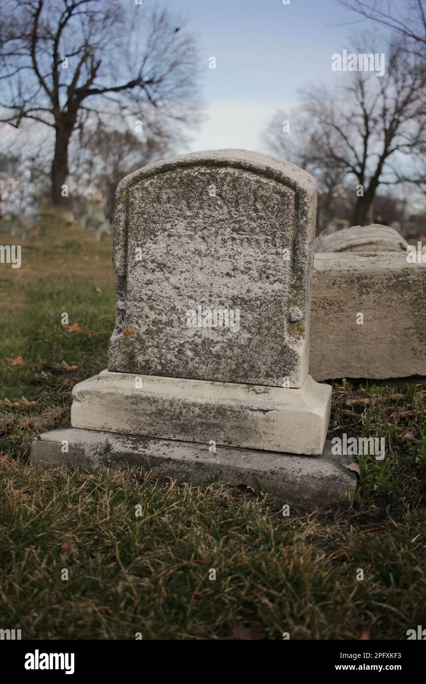 Vintage traditional stone gravestone with a blank epitaph and room for ...