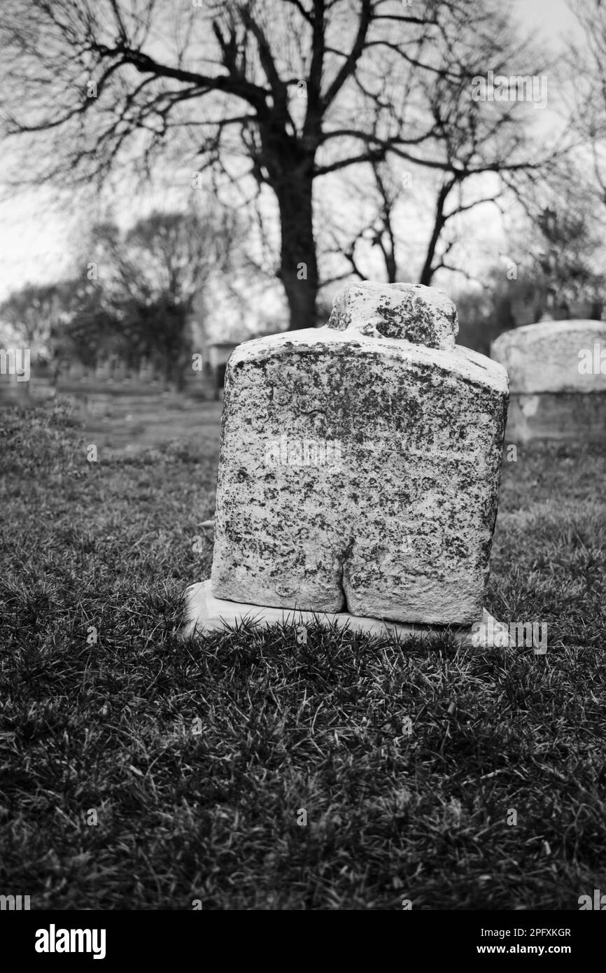 Vintage traditional stone gravestone with a blank epitaph and room for ...