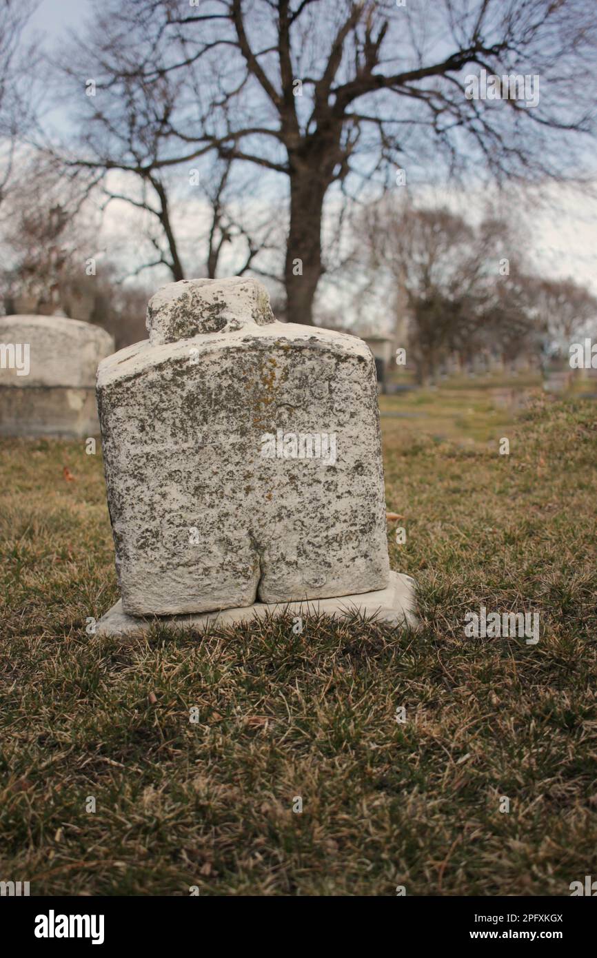 Vintage traditional stone gravestone with a blank epitaph and room for ...