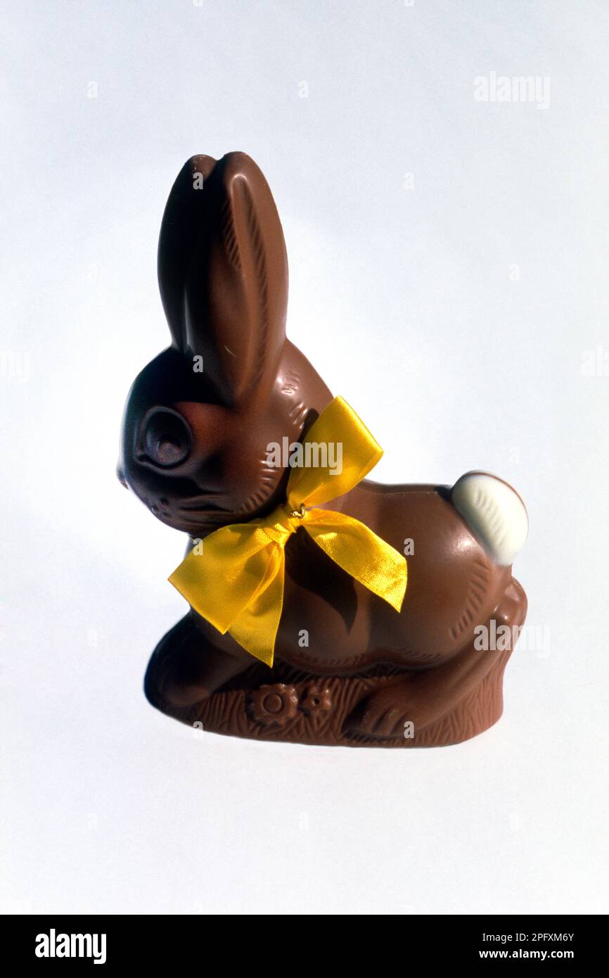 Milk Chocolate Easter Bunny with Yellow Ribbon Stock Photo - Alamy