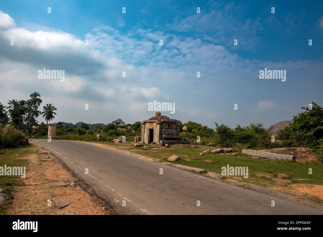 A nondescript road side monument in ruins in Hampi. Hampi, the capital ...
