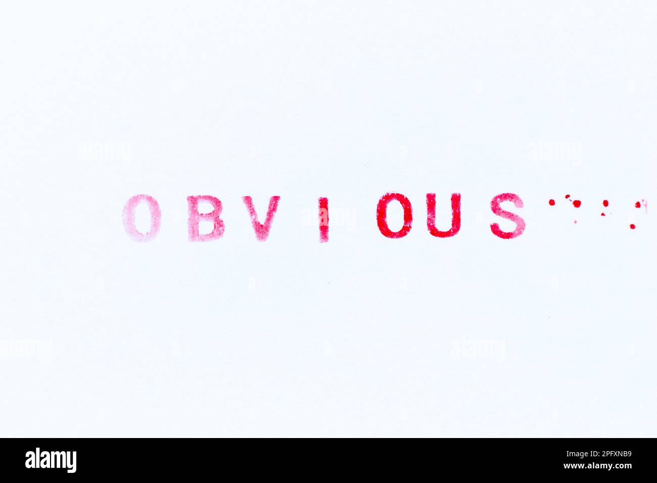 Red color ink rubber stamp in word obvious on white paper background ...