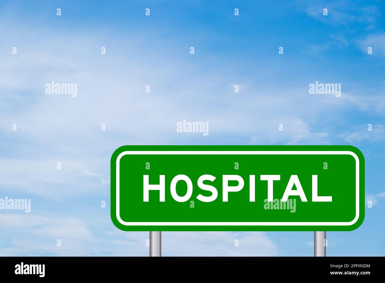 Green color transportation sign with word hospital on blue sky with ...