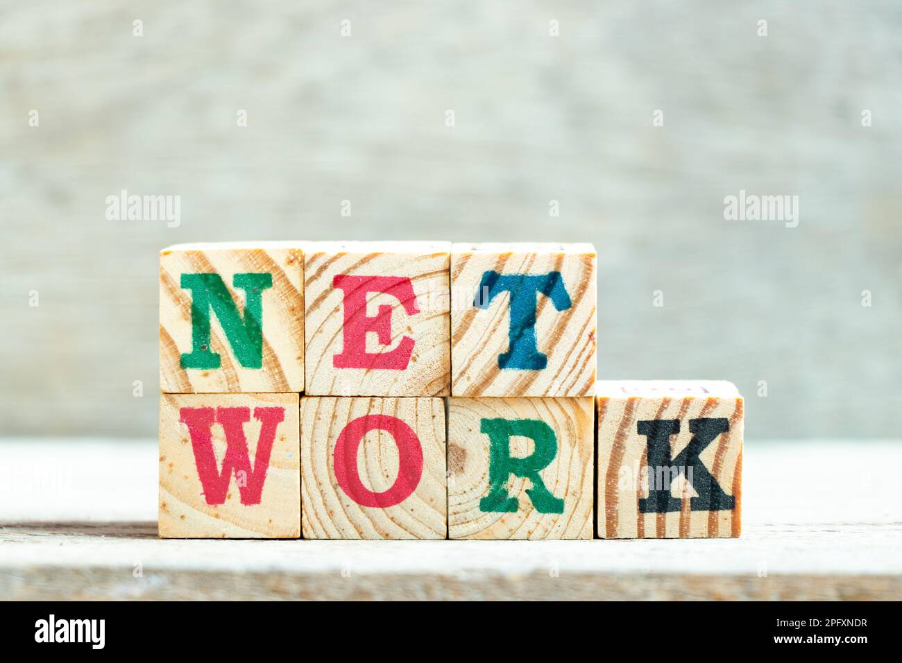 Alphabet letter block in word network on wood background Stock Photo ...