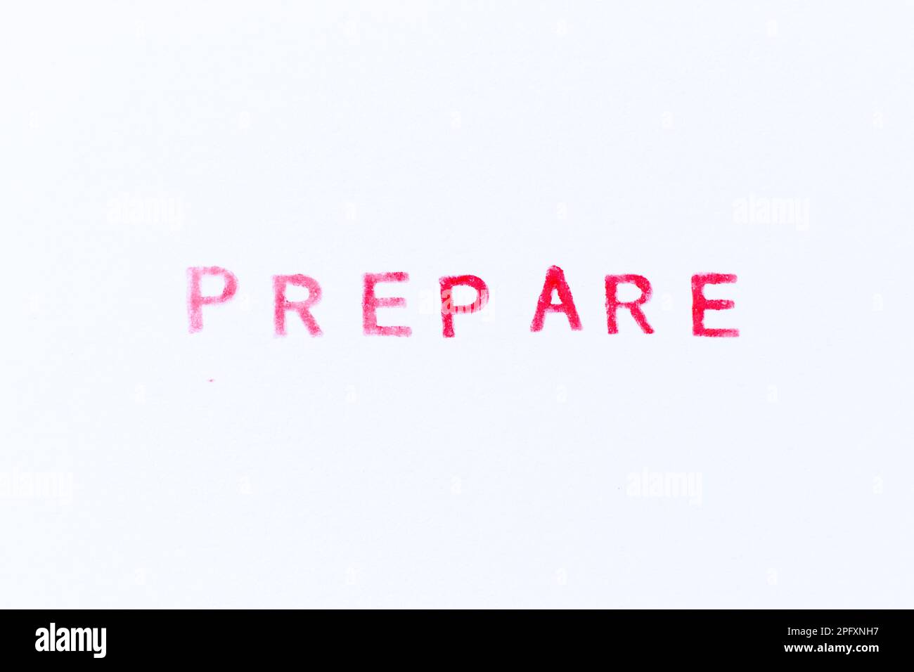 Red color ink rubber stamp in word prepare on white paper background ...