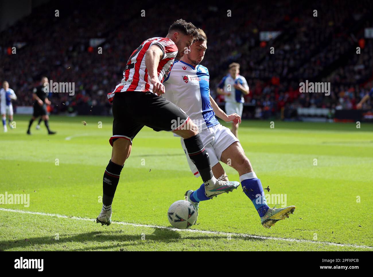 Sheffield United's George Baldock and Blackburn Rovers' Harry Pickering ...