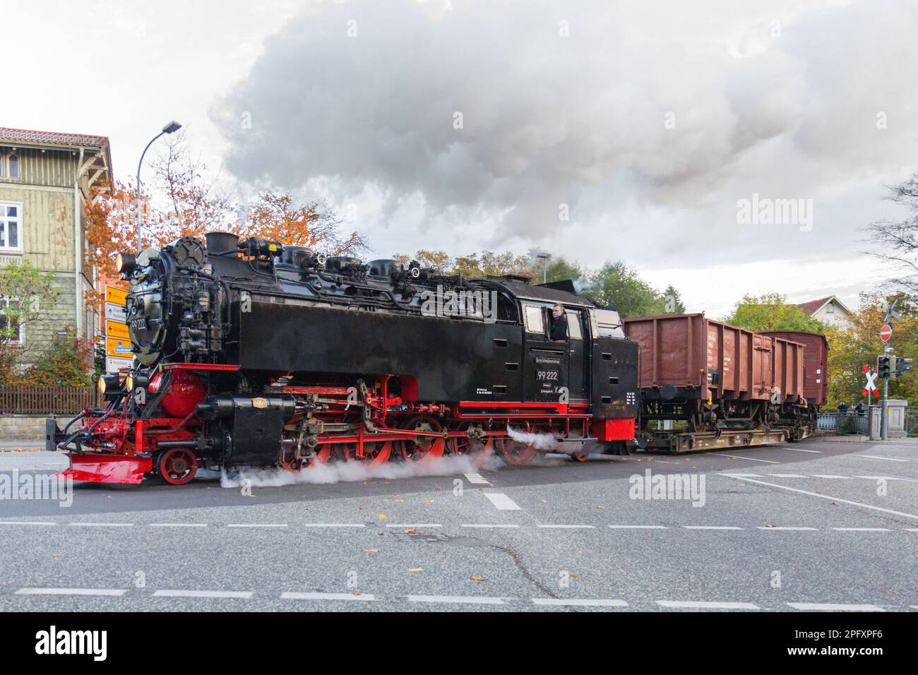 A freight train pulled by a steam loco on the Harz Railway in ...