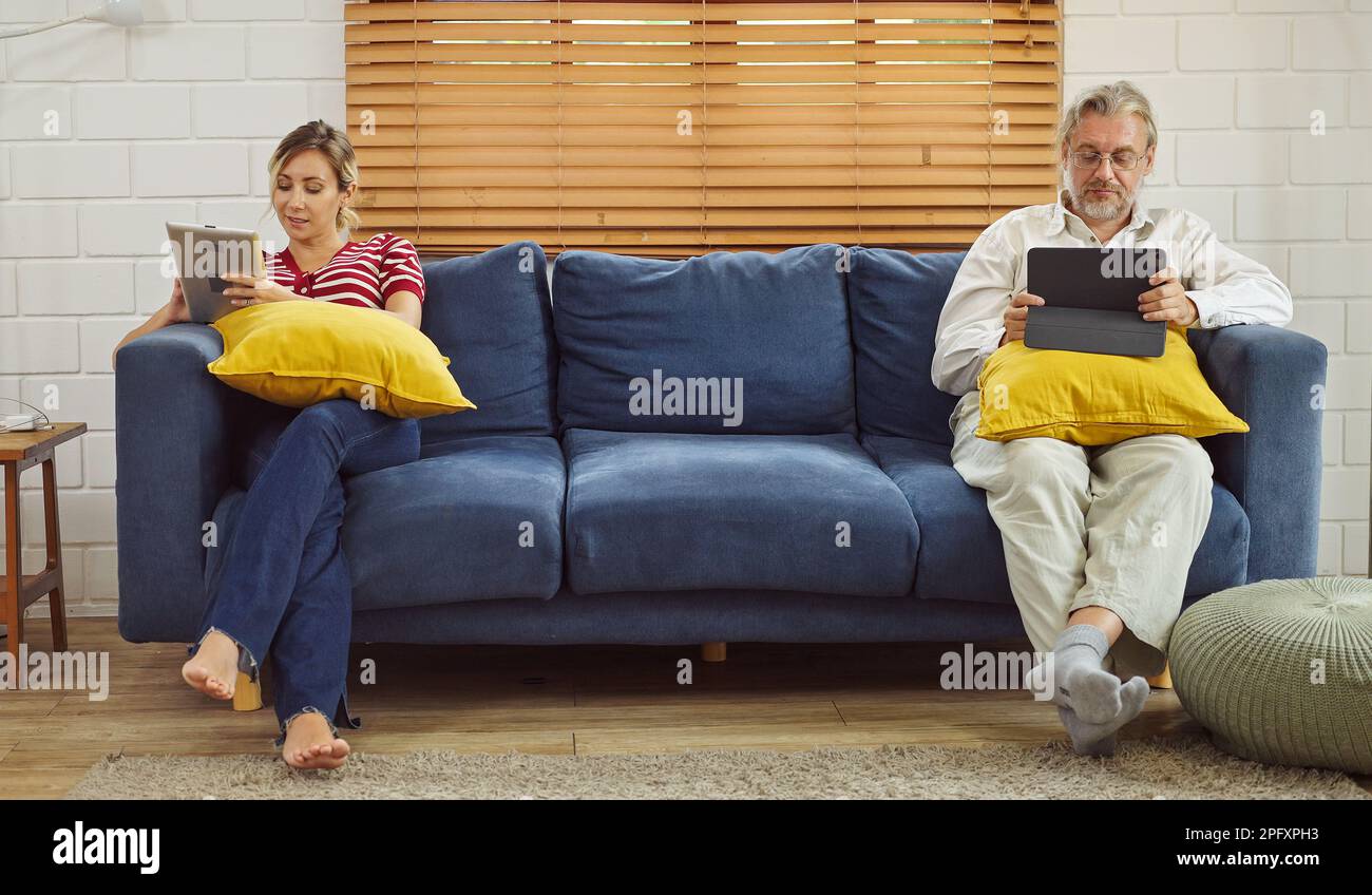 Gadgets Addiction. father and dauther holding and using different ...