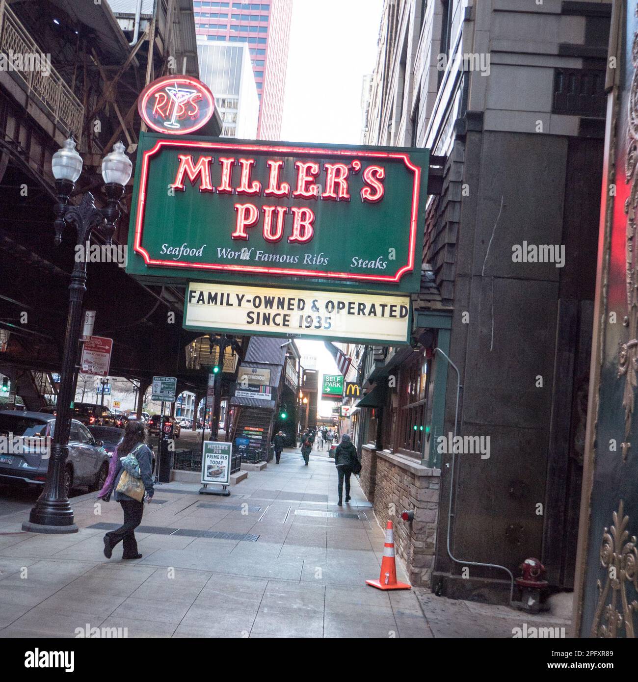 Miller's Pub, Chicago, lighted red neon sign Stock Photo - Alamy
