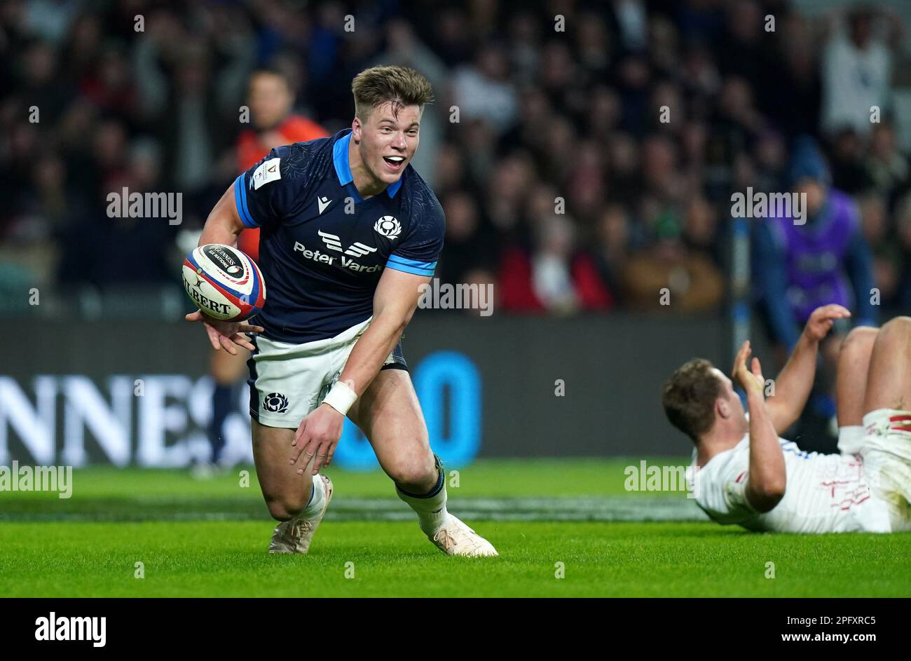 File photo dated 04-02-2023 of Scotland's Huw Jones celebrates scoring ...