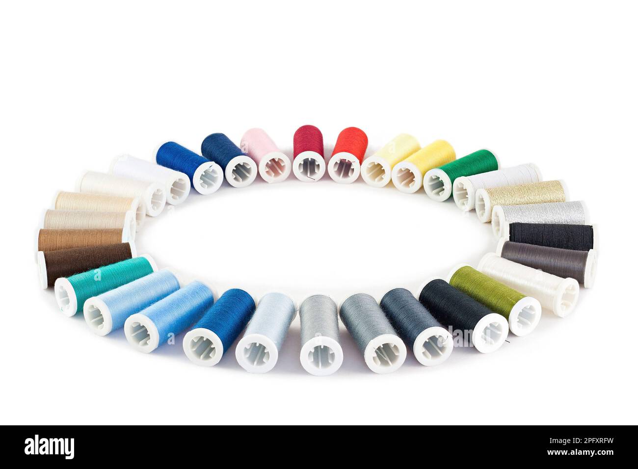Set of colorful spools of thread on white background Stock Photo - Alamy