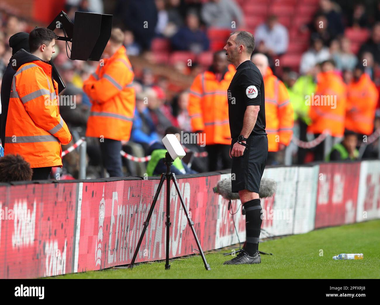 Sheffield, UK. 19th Mar, 2023. Referee Tim Robinson checks the VAR ...