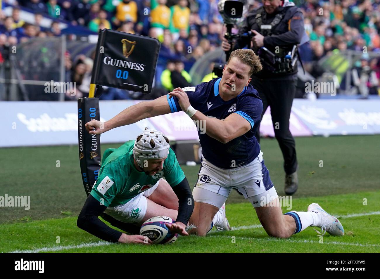 File photo dated 12-03-2023 of Ireland’s Mack Hansen scores a try ...