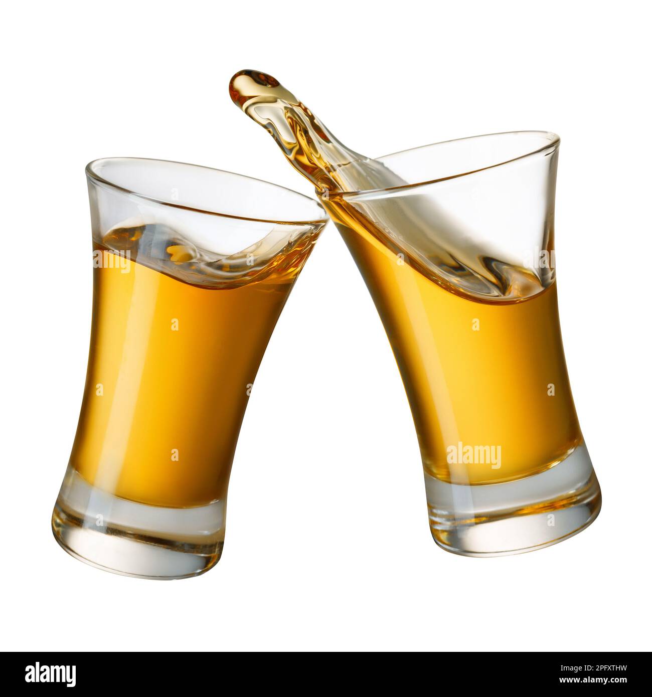glasses shot of gold tequila making toast with splash isolated on white ...