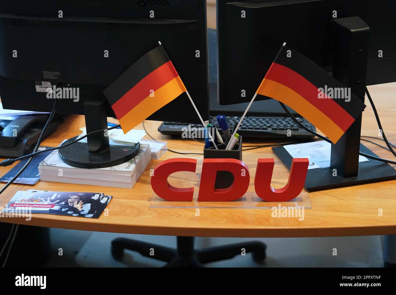 Hamburg, Germany. 19th Mar, 2023. A CDU logo and two German flags stand ...