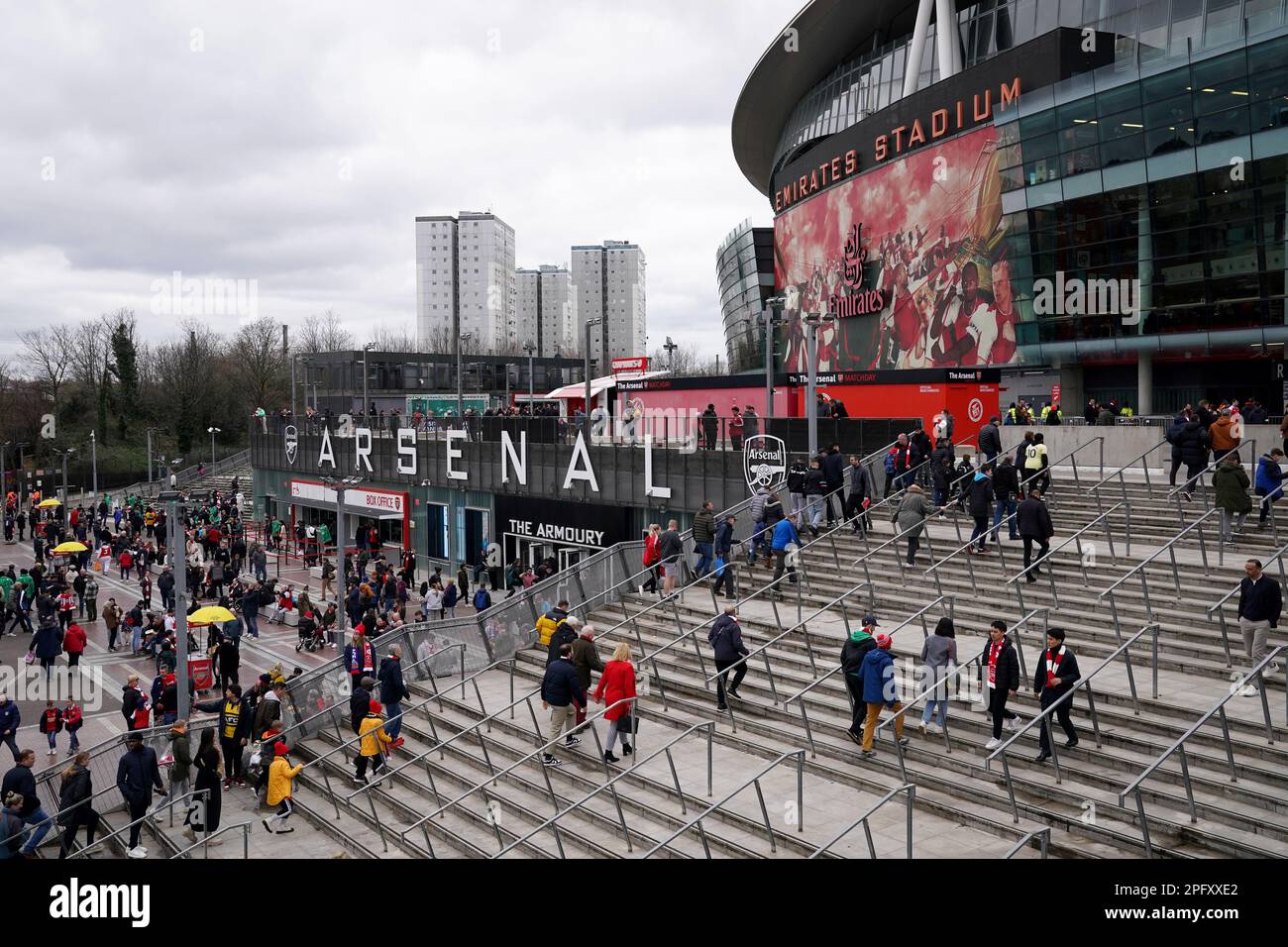 Arsenal fans make their way up the steps outside the ground before the ...