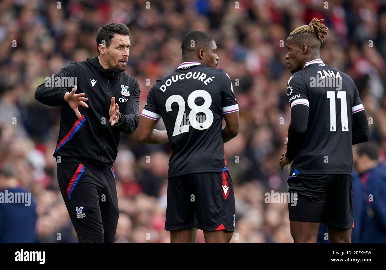 Crystal Palace interim manager Paddy McCarthy speaks to Cheick Doucoure ...