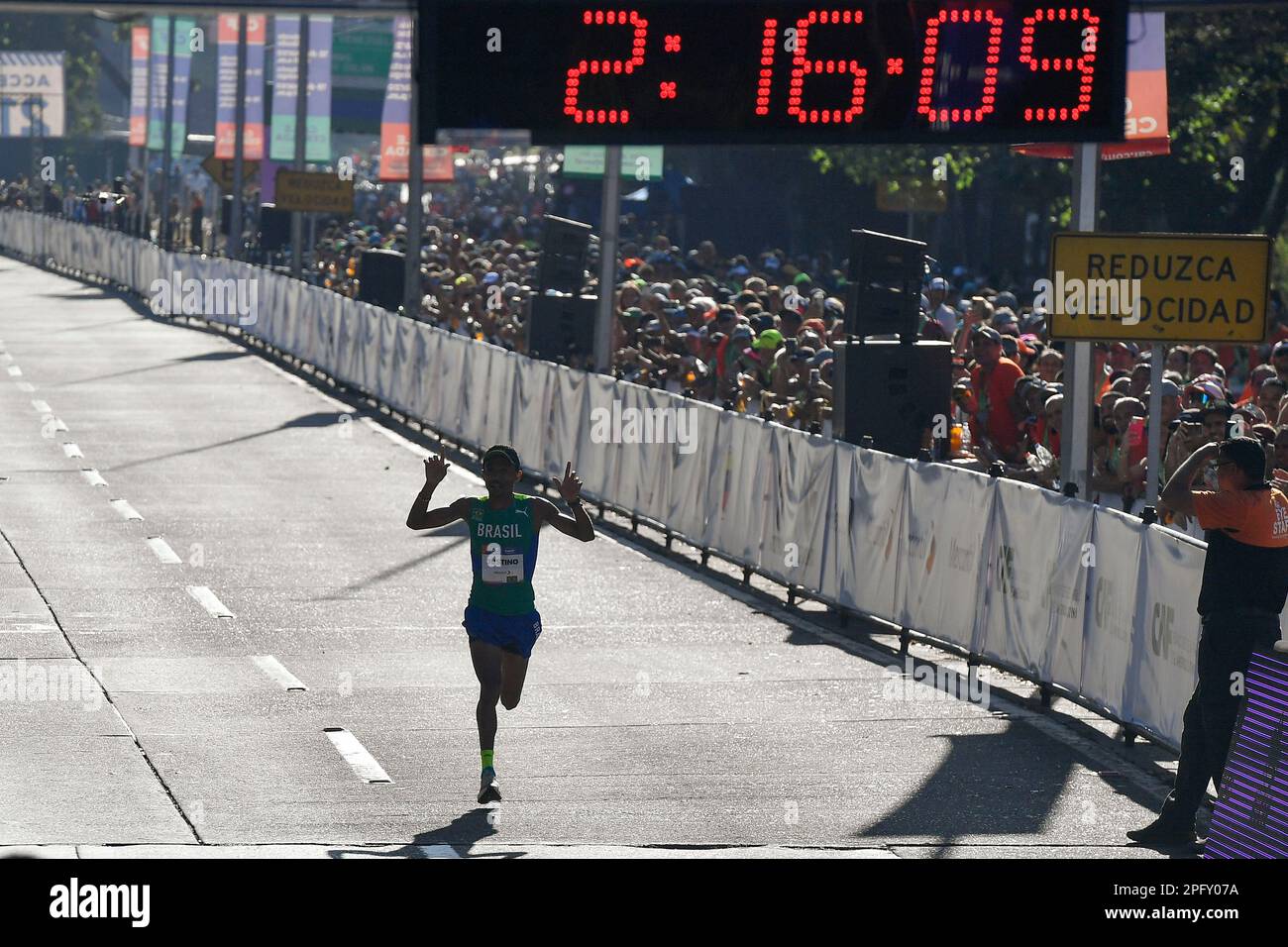 Brazilian runner Justino Pedro Da Silva celebrates his first place ...