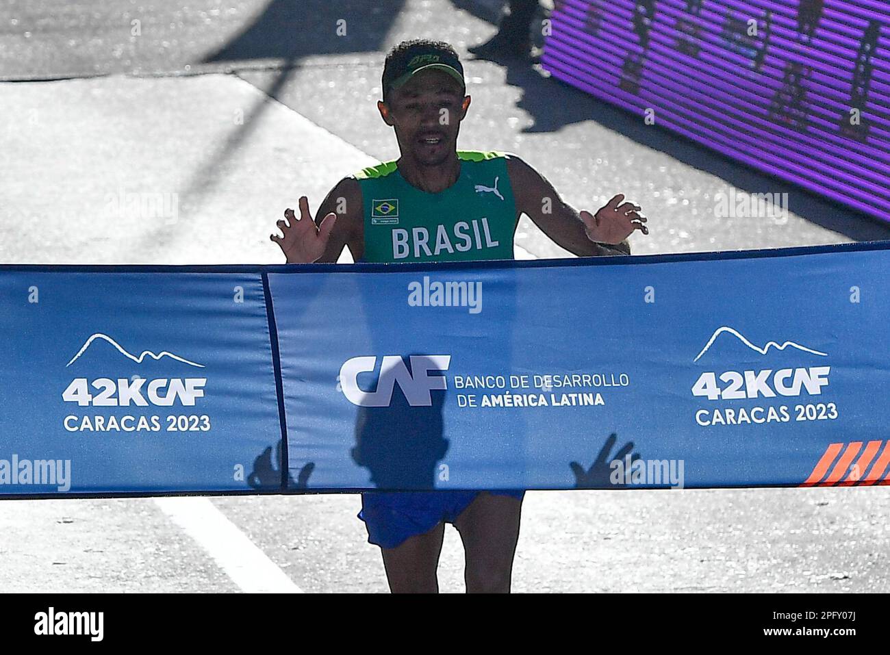 Brazilian runner Justino Pedro Da Silva celebrates his first place as ...