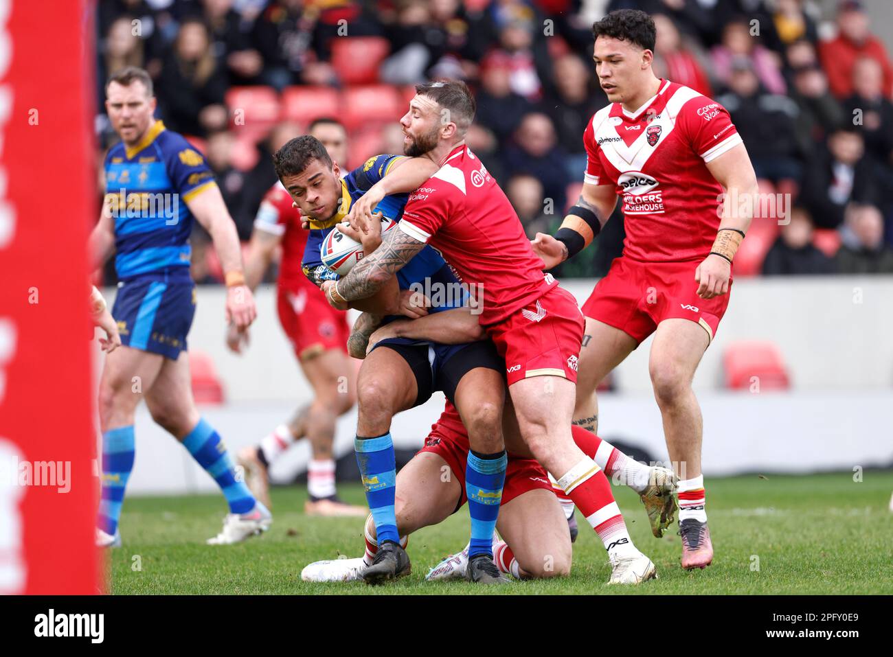 Wakefield Trinity's Corey Hall is tackled during the Betfred Super ...