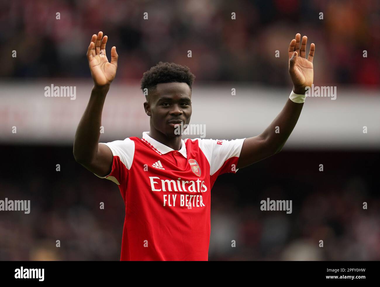 Arsenal's Bukayo Saka celebrates after the Premier League match at the ...
