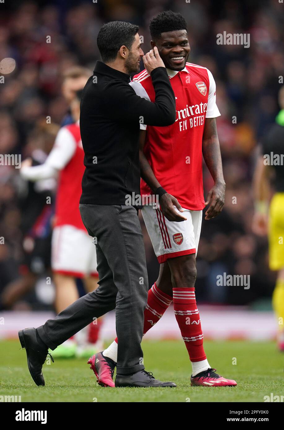 Arsenal manager Mikel Arteta and Thomas Partey speak after the Premier League match at the ...