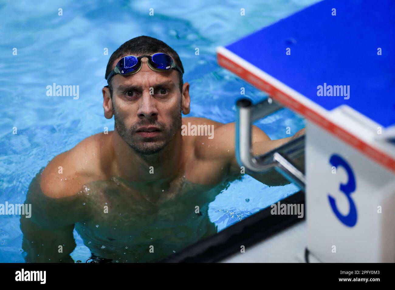 Argentina's Elian Araya reacts after the Men's MC 100m Butterfly heats ...