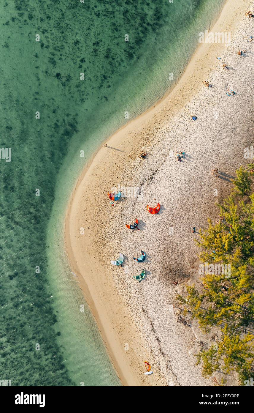 Colorful kites on Le Morne sandy beach with a turquoise clean lagoon ...