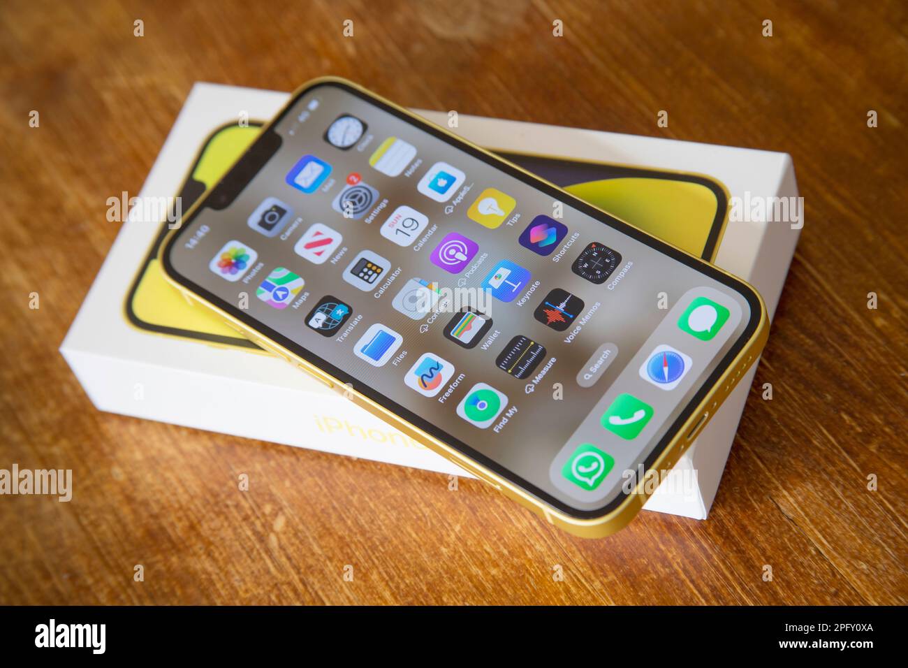 Latest iPhone 14 in Yellow Stock Photo - Alamy