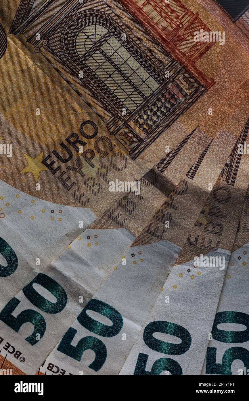 A vertical shot of Greek 50 Euro banknotes background Stock Photo - Alamy