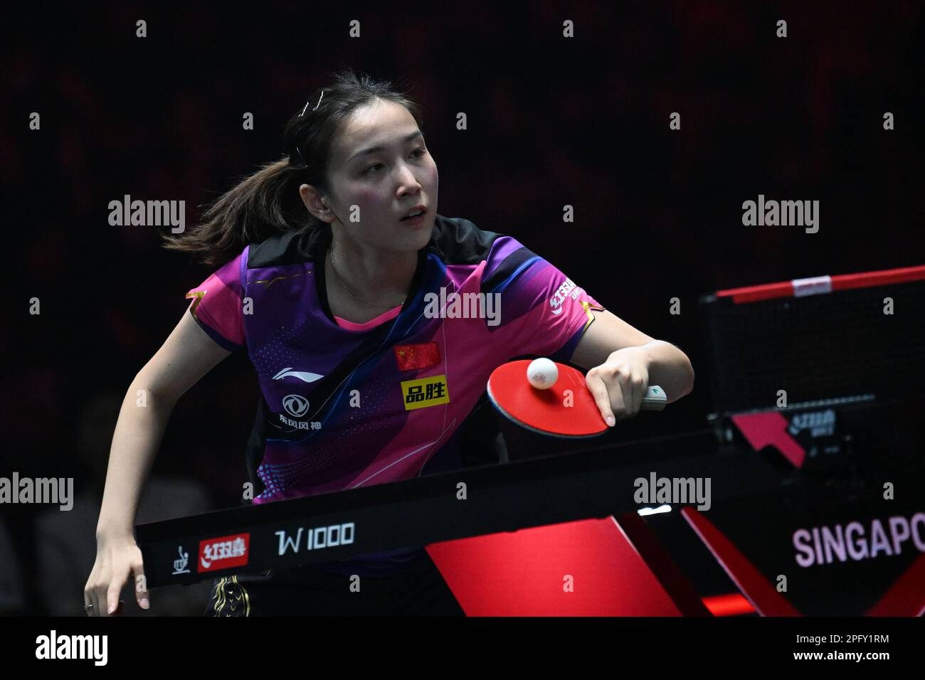 Singapore. 19th Mar, 2023. Qian Tianyi of China hits a return during the women's singles final ...