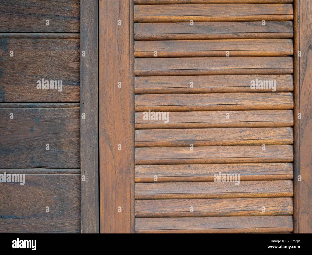 Wooden window with brown shutters background. Close-up pattern texture ...