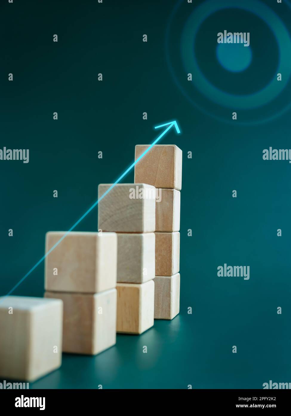 Straight arrow rising up to the big target icon over wooden cube blocks ...