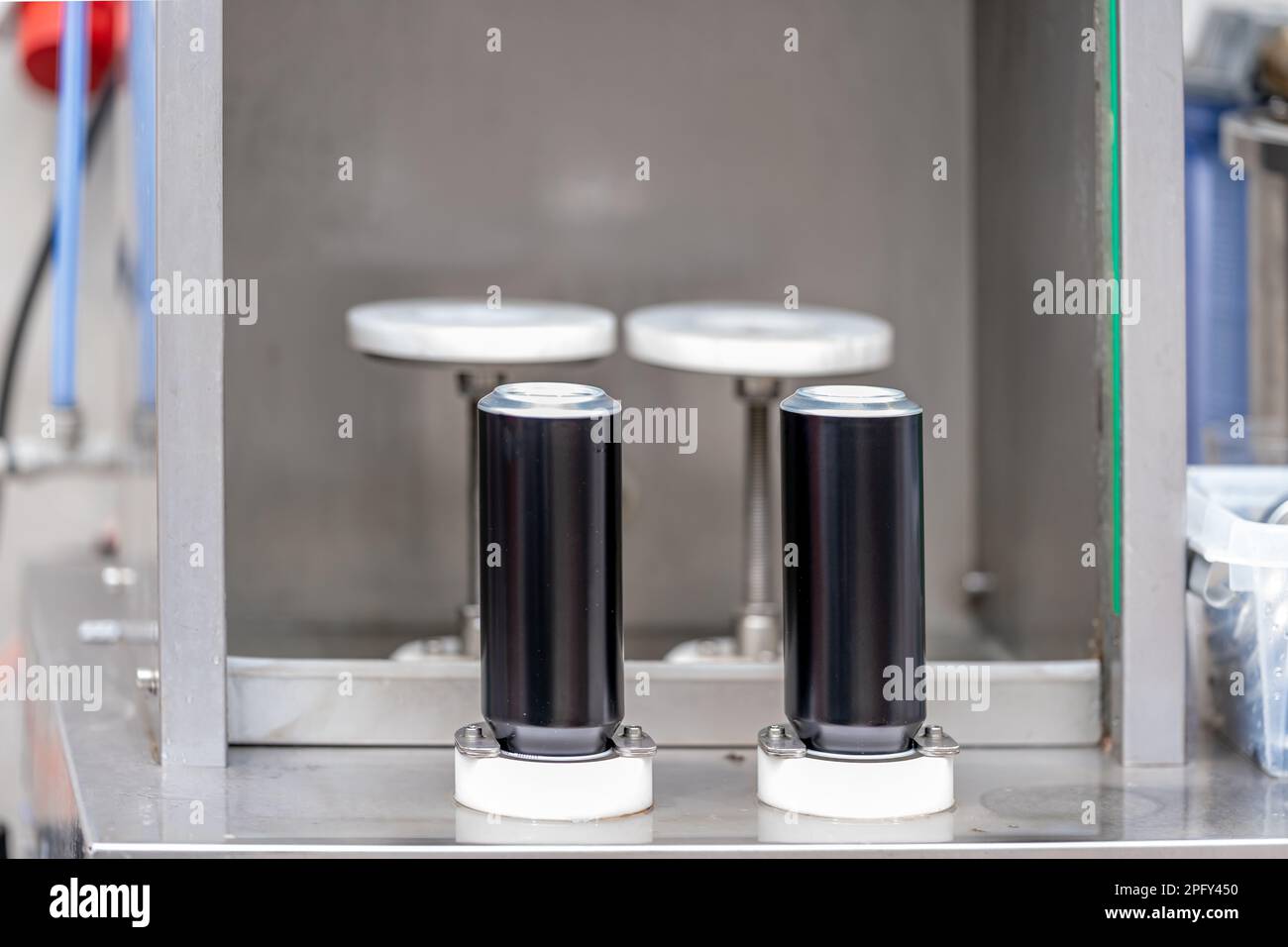 machine for filling beer cans in a brewery Stock Photo - Alamy