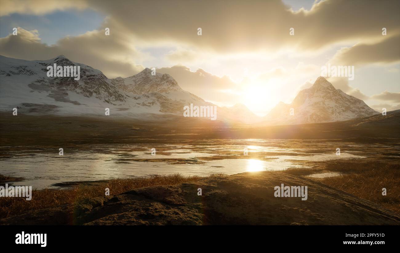 Rocky Mountain Peaks during golden sunrise sky Stock Photo - Alamy