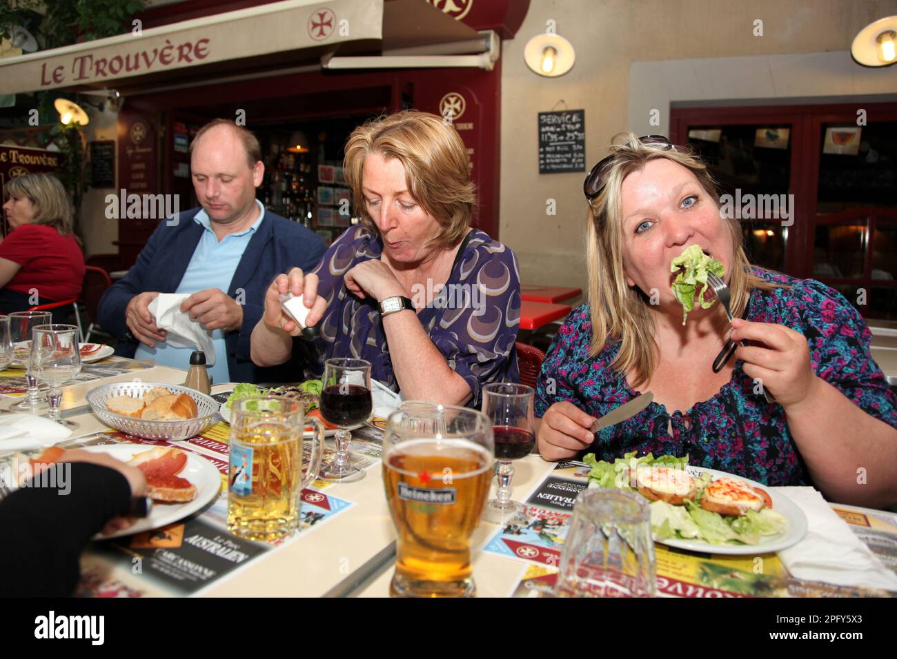 Family eating in a french restaurant hi-res stock photography and ...