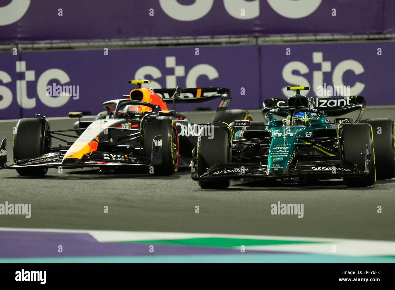 Aston Martin driver Fernando Alonso of Spain leads at the start during ...