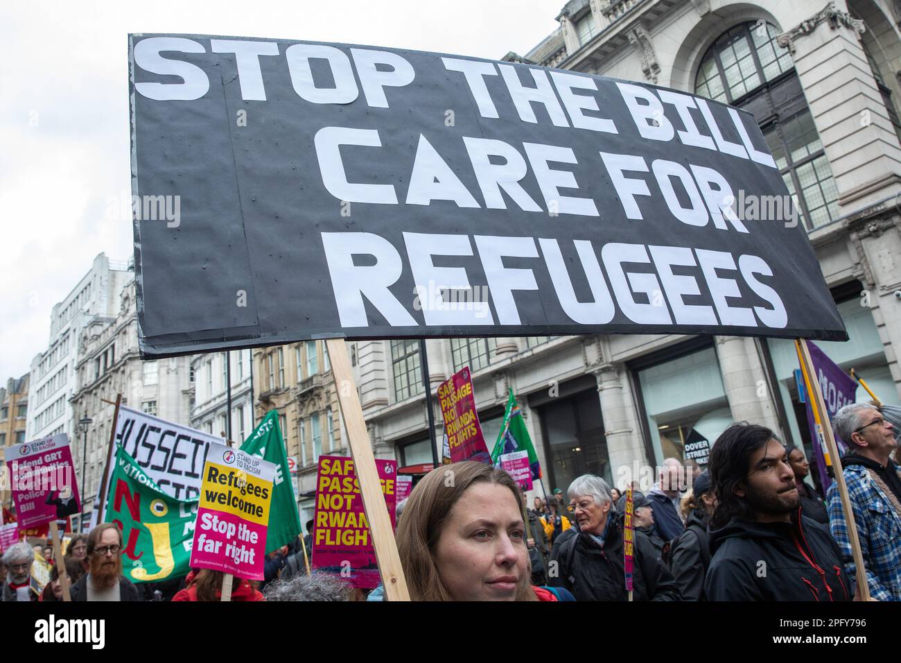 London, UK. 18th March, 2023. Anti-racist campaigners march from the ...