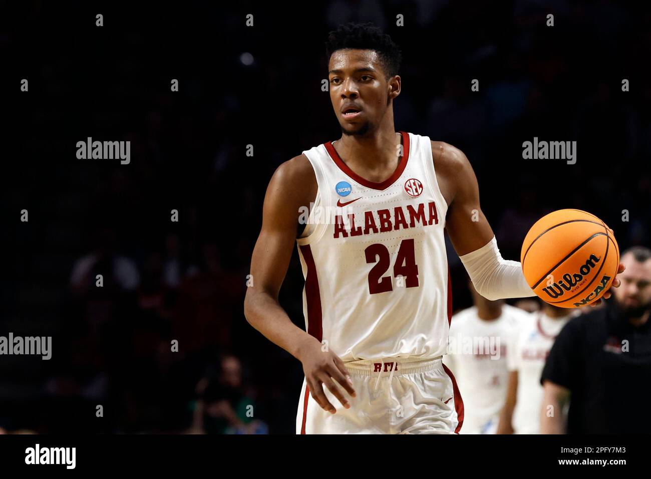 Alabama forward Brandon Miller (24) dribbles the ball in the first half ...